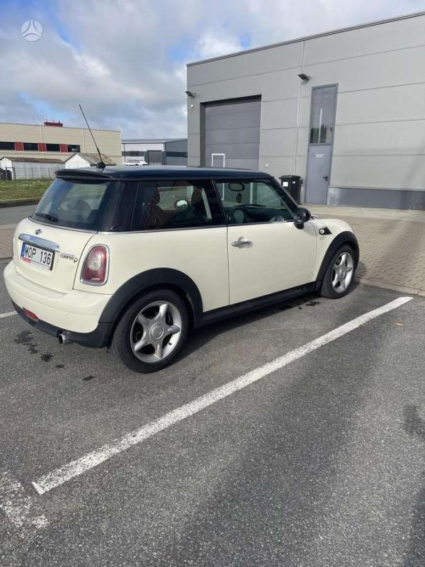 Yellow MINI Cooper 2007 in Siauliai, with an engine capacity of 1.60 L and mileage of 235 thousand km for 1450 €, photo 7 on AUTOMOTO.COM.LV