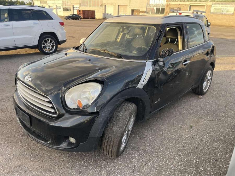 Black MINI Countryman 2010 in Panevezys, with an engine capacity of 1.60 L and mileage of 265 thousand km for 1950 €, photo 1 on AUTOMOTO.COM.LV
