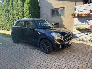 Black MINI Countryman 2010 in Tukums, with an engine capacity of 1.60 L and mileage of 19 thousand km for 3600 €, photo  on AUTOMOTO.COM.LV
