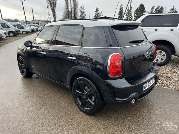 Black MINI Countryman 2011 in Taurage, with an engine capacity of 2.00 L and mileage of 220 thousand km for 6250 €, photo 6 on AUTOMOTO.COM.LV