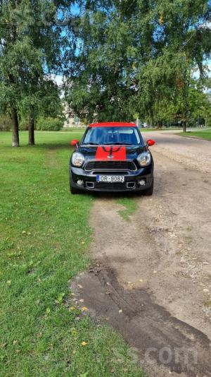 Black MINI Countryman 2011 in Riga, with an engine capacity of 2.00 L and mileage of 174 thousand km for 5800 €, photo 3 on AUTOMOTO.COM.LV