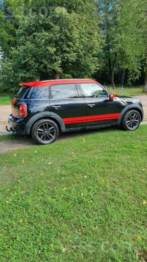 Black MINI Countryman 2011 in Riga, with an engine capacity of 2.00 L and mileage of 174 thousand km for 5800 €, photo 6 on AUTOMOTO.COM.LV