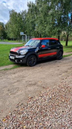 Black MINI Countryman 2011 in Riga, with an engine capacity of 2.00 L and mileage of 174 thousand km for 5800 €, photo 7 on AUTOMOTO.COM.LV