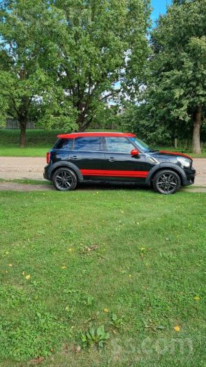 Black MINI Countryman 2011 in Riga, with an engine capacity of 2.00 L and mileage of 174 thousand km for 5800 €, photo 11 on AUTOMOTO.COM.LV
