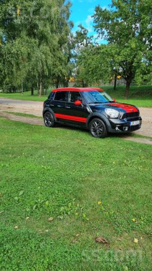 Black MINI Countryman 2011 in Riga, with an engine capacity of 2.00 L and mileage of 174 thousand km for 5800 €, photo 12 on AUTOMOTO.COM.LV