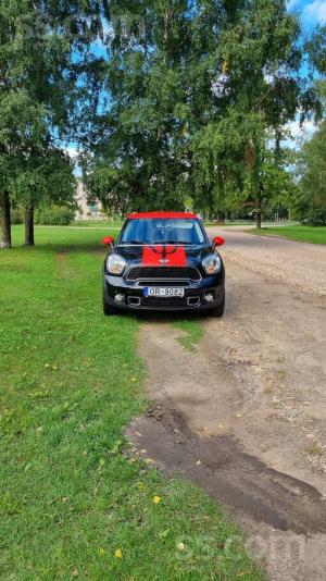 Black MINI Countryman 2011 in Riga, with an engine capacity of 2.00 L and mileage of 174 thousand km for 5800 €, photo 13 on AUTOMOTO.COM.LV