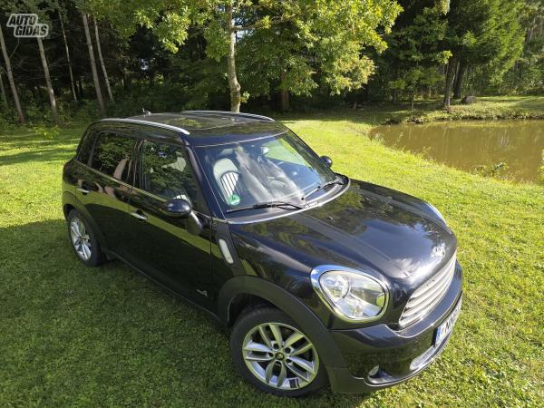 Black MINI Countryman 2011 in Klaipeda, with an engine capacity of 1.60 L and mileage of 228 thousand km for 5900 €, photo 1 on AUTOMOTO.COM.LV