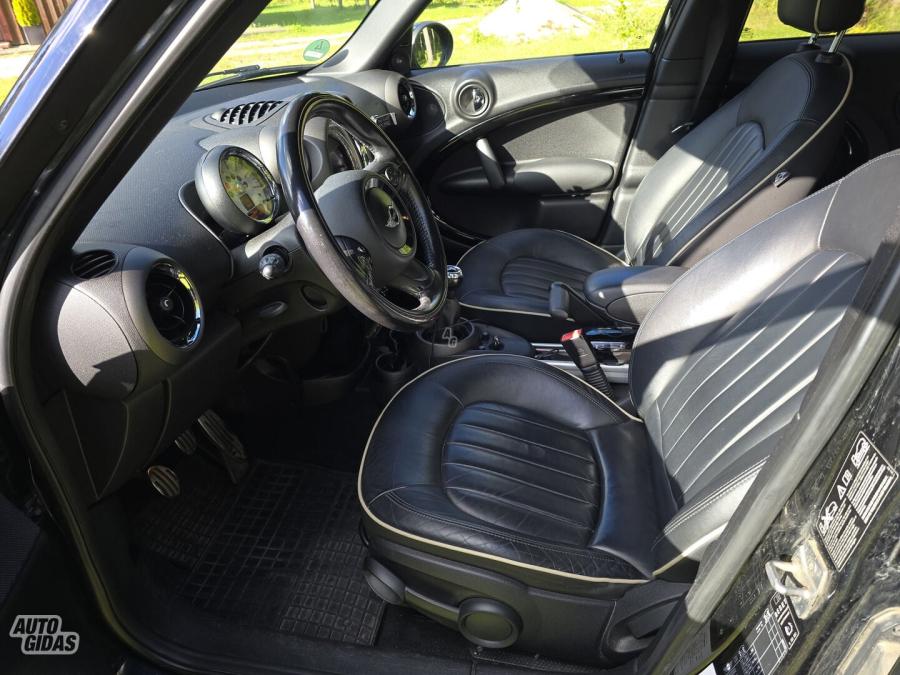 Black MINI Countryman 2011 in Klaipeda, with an engine capacity of 1.60 L and mileage of 228 thousand km for 5900 €, photo 28 on AUTOMOTO.COM.LV