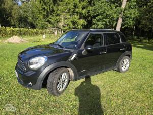 Black MINI Countryman 2011 in Klaipeda, with an engine capacity of 1.60 L and mileage of 228 thousand km for 5900 €, photo 40 on AUTOMOTO.COM.LV