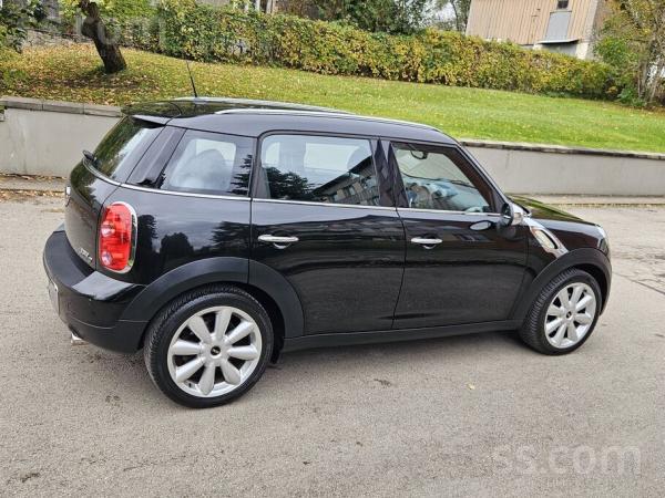 Black MINI Countryman 2011 in Jekabpils, with an engine capacity of 1.60 L and mileage of 168 thousand km for 6990 €, photo 7 on AUTOMOTO.COM.LV