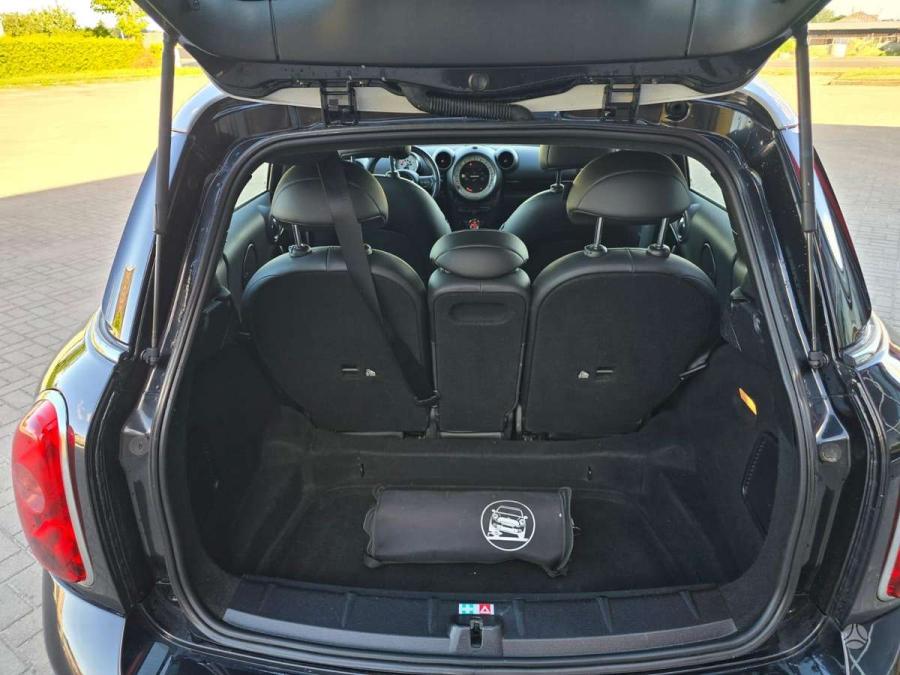 Black MINI Countryman 2012 in Taurage, with an engine capacity of 1.60 L and mileage of 200 thousand km for 5499 €, photo 7 on AUTOMOTO.COM.LV