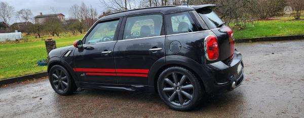Black MINI Countryman 2013 in Birzai, with an engine capacity of 2.00 L and mileage of 249 thousand km for 5899 €, photo 4 on AUTOMOTO.COM.LV
