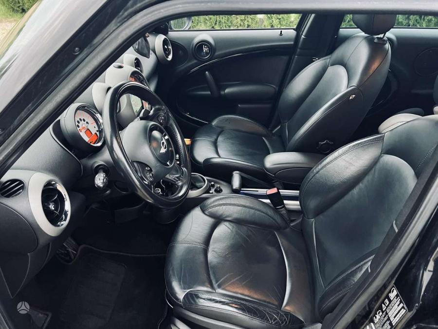 Black MINI Countryman 2013 in Alytus, with an engine capacity of 1.60 L and mileage of 204 thousand km for 7490 €, photo 16 on AUTOMOTO.COM.LV
