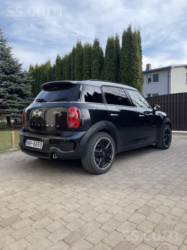 Black MINI Countryman 2015 in Riga, with an engine capacity of 2.00 L and mileage of 175 thousand km for 8350 €, photo 7 on AUTOMOTO.COM.LV