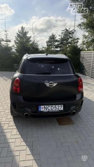 Black MINI Countryman 2015 in Klaipeda, with an engine capacity of 1.60 L and mileage of 176 thousand km for 8400 €, photo 6 on AUTOMOTO.COM.LV