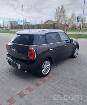Black MINI Countryman 2011 in Daugavpils, with an engine capacity of 1.60 L and mileage of 0 thousand km for 8300 €, photo 3 on AUTOMOTO.COM.LV
