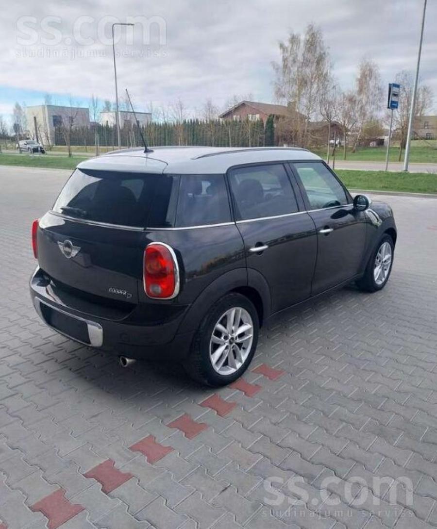 Black MINI Countryman 2011 in Daugavpils, with an engine capacity of 1.60 L and mileage of 0 thousand km for 8300 €, photo 3 on AUTOMOTO.COM.LV