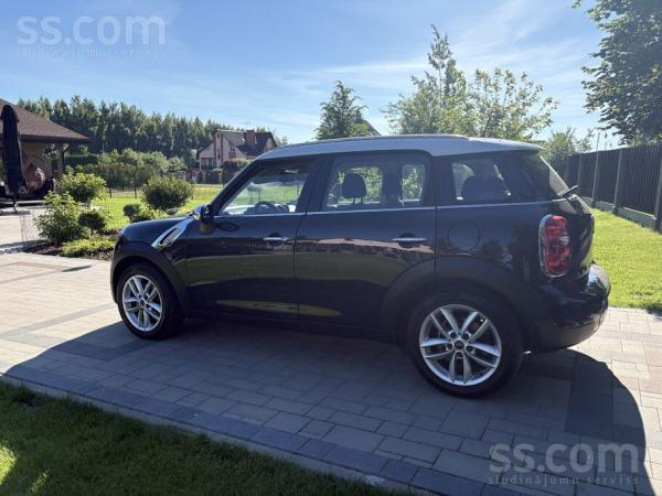 Black MINI Countryman 2011 in Bauska, with an engine capacity of 1.60 L and mileage of 221 thousand km for 3999 €, photo 3 on AUTOMOTO.COM.LV