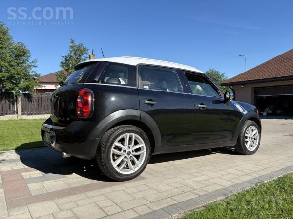 Black MINI Countryman 2011 in Bauska, with an engine capacity of 1.60 L and mileage of 221 thousand km for 3999 €, photo 6 on AUTOMOTO.COM.LV