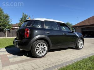 Black MINI Countryman 2011 in Bauska, with an engine capacity of 1.60 L and mileage of 221 thousand km for 3999 €, photo 7 on AUTOMOTO.COM.LV