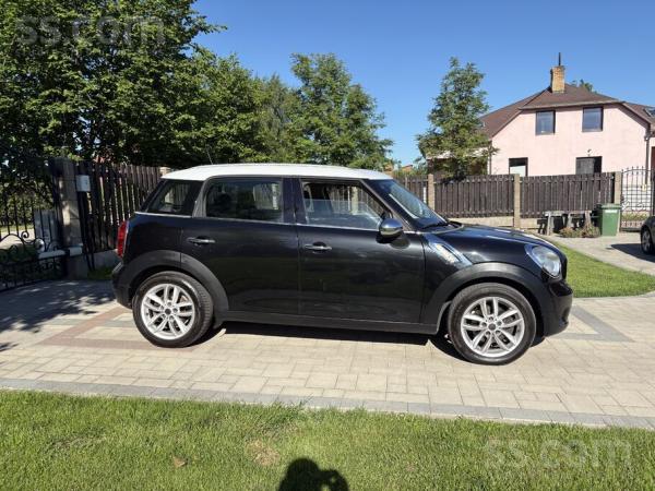 Black MINI Countryman 2011 in Bauska, with an engine capacity of 1.60 L and mileage of 221 thousand km for 3999 €, photo 7 on AUTOMOTO.COM.LV