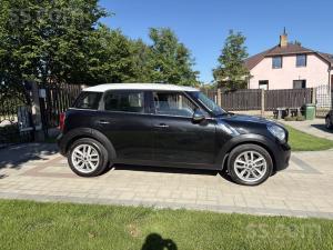 Black MINI Countryman 2011 in Bauska, with an engine capacity of 1.60 L and mileage of 221 thousand km for 3999 €, photo 8 on AUTOMOTO.COM.LV
