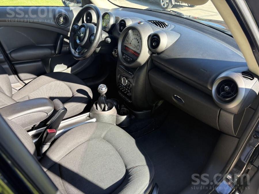 Black MINI Countryman 2011 in Bauska, with an engine capacity of 1.60 L and mileage of 221 thousand km for 3999 €, photo 11 on AUTOMOTO.COM.LV