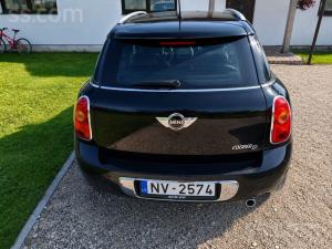 Black MINI Countryman 2011 in Ogre, with an engine capacity of 2.00 L and mileage of 202 thousand km for 5500 €, photo 5 on AUTOMOTO.COM.LV