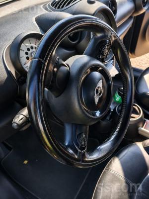 Black MINI Countryman 2011 in Ogre, with an engine capacity of 2.00 L and mileage of 202 thousand km for 5500 €, photo 8 on AUTOMOTO.COM.LV