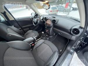 Black MINI Countryman 2012 in Riga, with an engine capacity of 1.60 L and mileage of 315 thousand km for 5990 €, photo 19 on AUTOMOTO.COM.LV