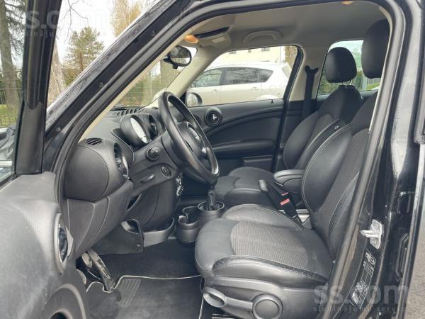 Black MINI Countryman 2012 in Riga, with an engine capacity of 1.60 L and mileage of 315 thousand km for 4990 €, photo 10 on AUTOMOTO.COM.LV