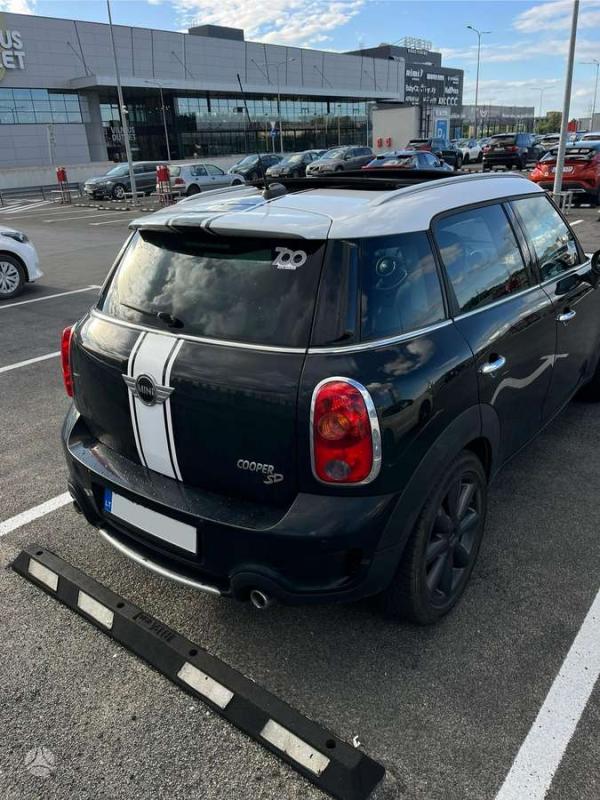 Black MINI Countryman 2012 in Vilnius, with an engine capacity of 2.00 L and mileage of 228 thousand km for 6900 €, photo 4 on AUTOMOTO.COM.LV