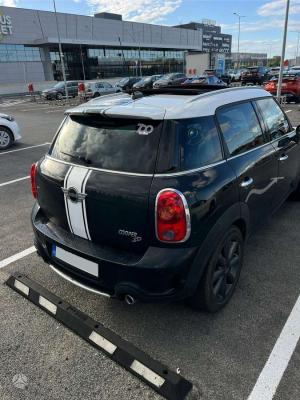 Black MINI Countryman 2012 in Vilnius, with an engine capacity of 2.00 L and mileage of 228 thousand km for 6900 €, photo 5 on AUTOMOTO.COM.LV