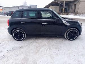 Black MINI Countryman 2013 in Marijampole, with an engine capacity of 2.00 L and mileage of 144 thousand km for 8500 €, photo 5 on AUTOMOTO.COM.LV