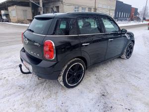 Black MINI Countryman 2013 in Marijampole, with an engine capacity of 2.00 L and mileage of 144 thousand km for 8500 €, photo 6 on AUTOMOTO.COM.LV