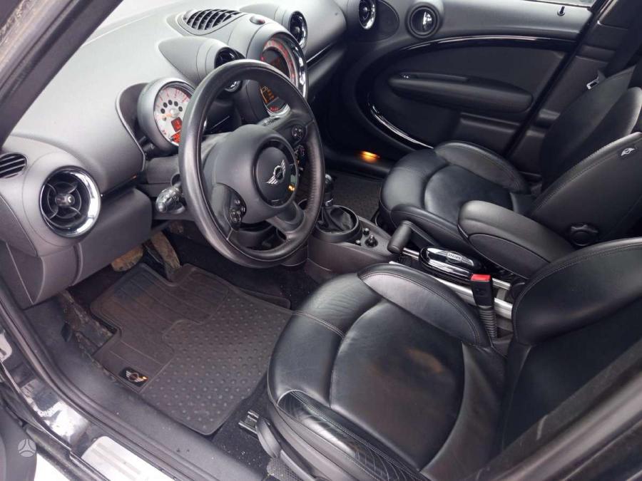 Black MINI Countryman 2013 in Marijampole, with an engine capacity of 2.00 L and mileage of 144 thousand km for 8500 €, photo 22 on AUTOMOTO.COM.LV