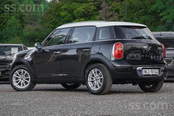 Black MINI Countryman 2013 in Riga, with an engine capacity of 2.00 L and mileage of 238 thousand km for 5590 €, photo 3 on AUTOMOTO.COM.LV