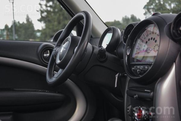 Black MINI Countryman 2013 in Riga, with an engine capacity of 2.00 L and mileage of 238 thousand km for 5590 €, photo 6 on AUTOMOTO.COM.LV