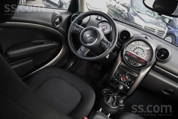 Black MINI Countryman 2013 in Riga, with an engine capacity of 2.00 L and mileage of 238 thousand km for 5590 €, photo 7 on AUTOMOTO.COM.LV