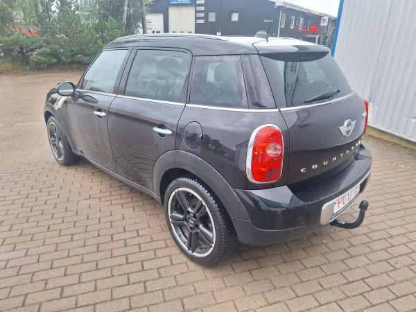 Black MINI Countryman 2013 in Marijampole, with an engine capacity of 2.00 L and mileage of 145 thousand km for 7500 €, photo 8 on AUTOMOTO.COM.LV