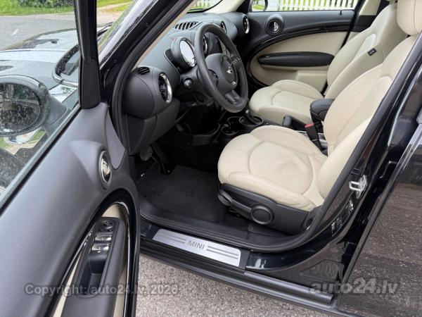 Black MINI Countryman 2014 in Tallinn, with an engine capacity of 2.00 L and mileage of 182 thousand km for 9490 €, photo 5 on AUTOMOTO.COM.LV