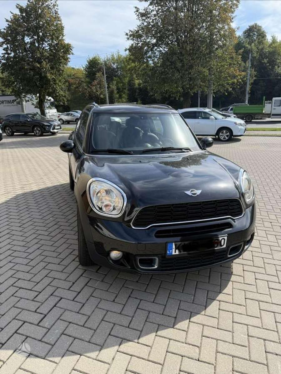 Black MINI Countryman 2014 in Vilnius, with an engine capacity of 1.60 L and mileage of 127 thousand km for 7600 €, photo 1 on AUTOMOTO.COM.LV