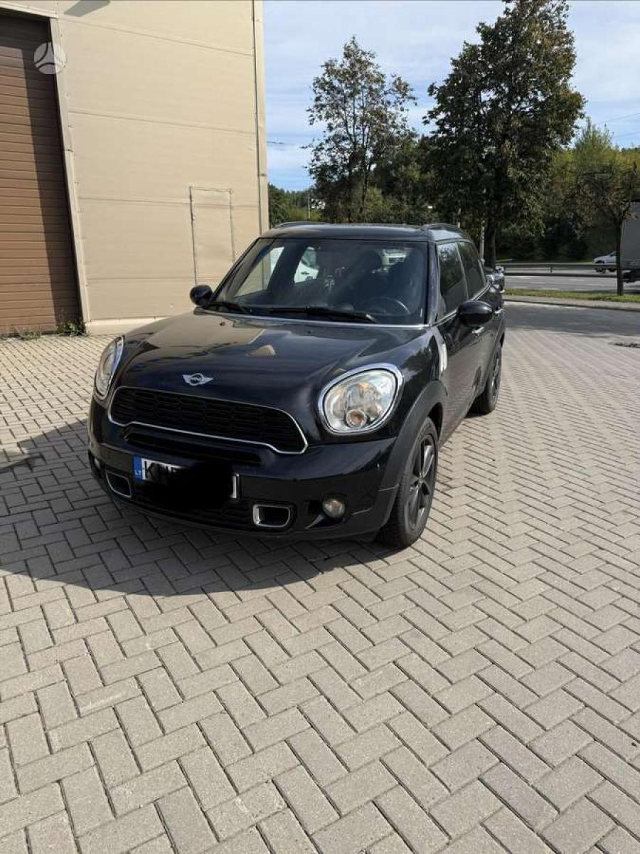 Black MINI Countryman 2014 in Vilnius, with an engine capacity of 1.60 L and mileage of 127 thousand km for 7600 €, photo 4 on AUTOMOTO.COM.LV