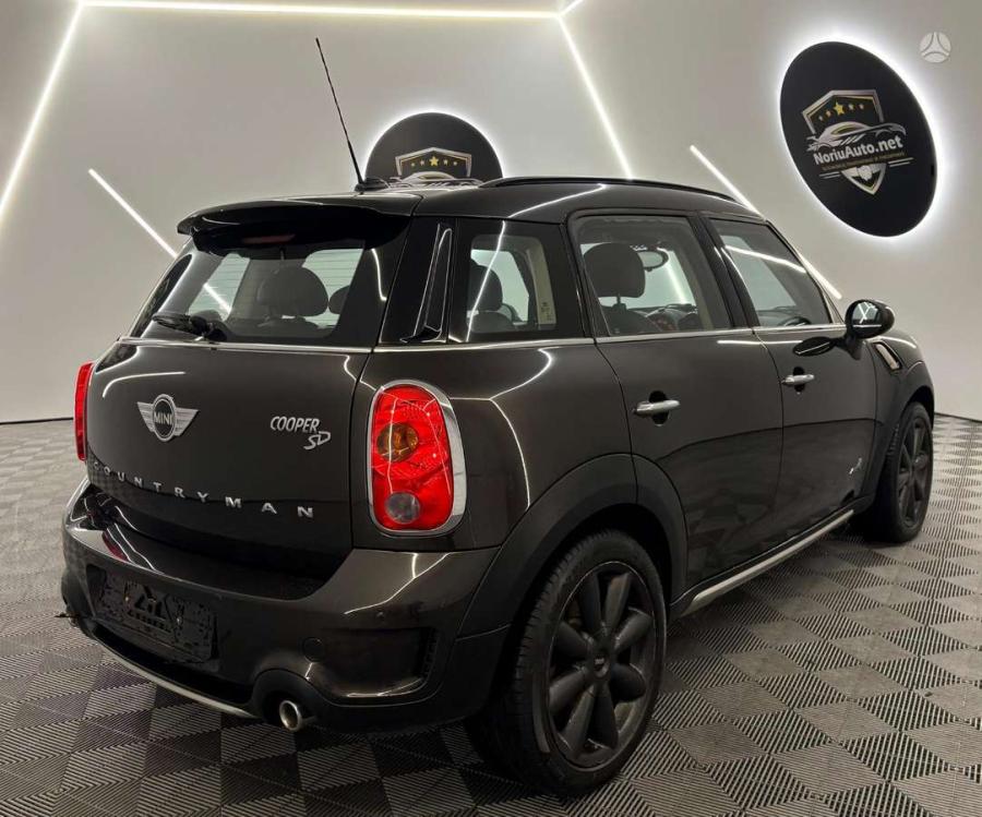 Black MINI Countryman 2015 in Marijampole, with an engine capacity of 2.00 L and mileage of 178 thousand km for 8650 €, photo 18 on AUTOMOTO.COM.LV