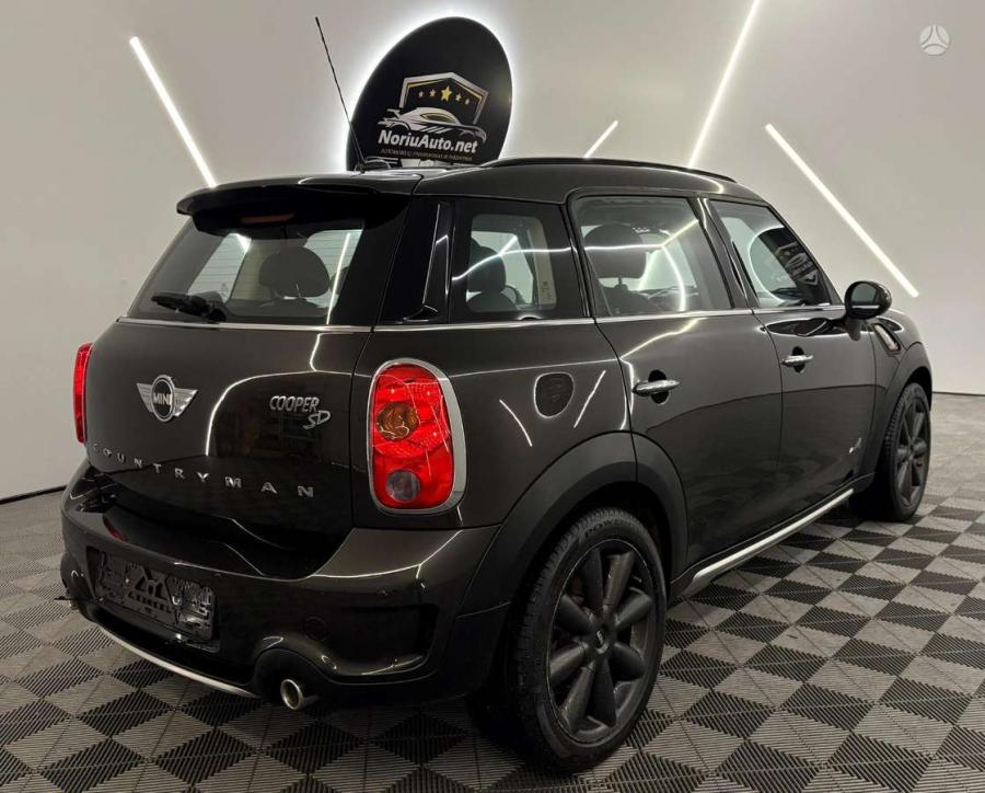 Black MINI Countryman 2015 in Marijampole, with an engine capacity of 2.00 L and mileage of 178 thousand km for 8650 €, photo 20 on AUTOMOTO.COM.LV