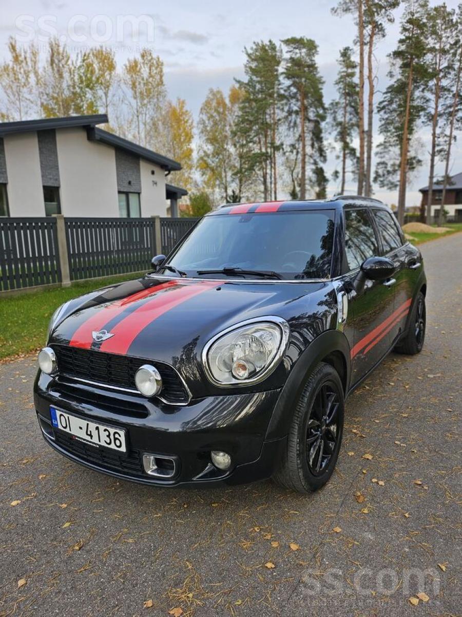 Black MINI Countryman 2011 in Riga, with an engine capacity of 1.60 L and mileage of 152 thousand km for 5950 €, photo 1 on AUTOMOTO.COM.LV