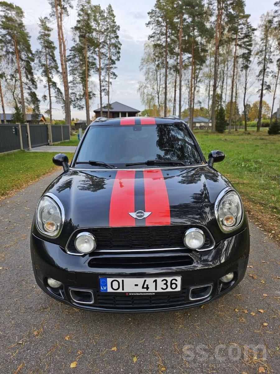 Black MINI Countryman 2011 in Riga, with an engine capacity of 1.60 L and mileage of 152 thousand km for 5950 €, photo 2 on AUTOMOTO.COM.LV