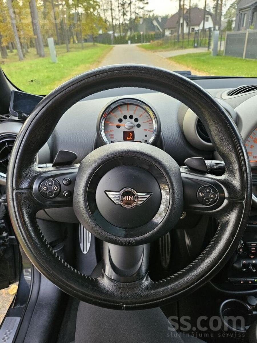 Black MINI Countryman 2011 in Riga, with an engine capacity of 1.60 L and mileage of 152 thousand km for 5950 €, photo 23 on AUTOMOTO.COM.LV