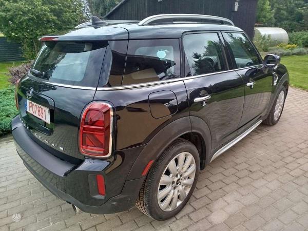 Black MINI Countryman 2021 in Plunge, with an engine capacity of 2.00 L and mileage of 82 thousand km for 17400 €, photo 2 on AUTOMOTO.COM.LV
