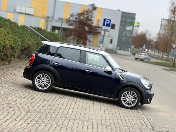 Blue MINI Countryman 2012 in Riga, with an engine capacity of 2.00 L and mileage of 221 thousand km for 7450 €, photo 4 on AUTOMOTO.COM.LV